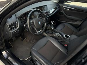 Black BMW X1 2014 in Kaunas, with an engine capacity of 2.00 L and mileage of 240 thousand km for 6350 €, photo 4 on AUTOMOTO.COM.LV