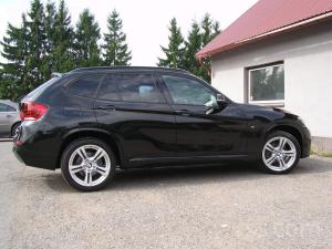 Black BMW X1 2014 in Riga, with an engine capacity of 2.00 L and mileage of 0 thousand km for 10950 €, photo 4 on AUTOMOTO.COM.LV