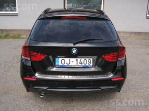 Black BMW X1 2014 in Riga, with an engine capacity of 2.00 L and mileage of 0 thousand km for 10950 €, photo 7 on AUTOMOTO.COM.LV