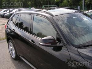 Black BMW X1 2014 in Riga, with an engine capacity of 2.00 L and mileage of 0 thousand km for 10950 €, photo 12 on AUTOMOTO.COM.LV