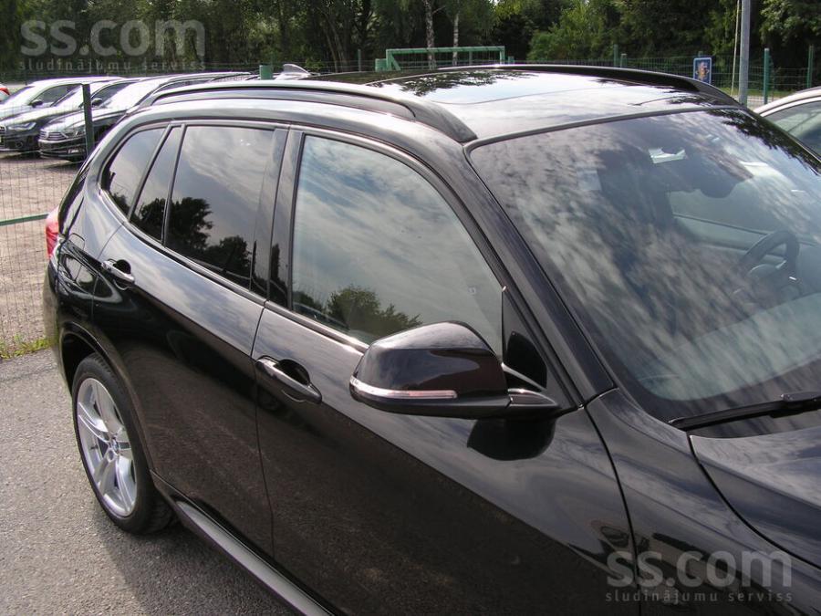 Black BMW X1 2014 in Riga, with an engine capacity of 2.00 L and mileage of 0 thousand km for 10950 €, photo 12 on AUTOMOTO.COM.LV