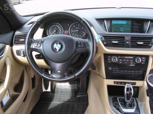 Black BMW X1 2014 in Riga, with an engine capacity of 2.00 L and mileage of 0 thousand km for 10950 €, photo 15 on AUTOMOTO.COM.LV