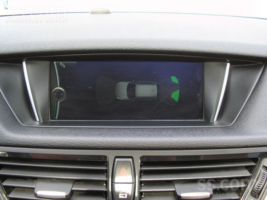 Black BMW X1 2014 in Riga, with an engine capacity of 2.00 L and mileage of 0 thousand km for 10950 €, photo 19 on AUTOMOTO.COM.LV