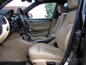 Black BMW X1 2014 in Riga, with an engine capacity of 2.00 L and mileage of 0 thousand km for 10950 €, photo 21 on AUTOMOTO.COM.LV
