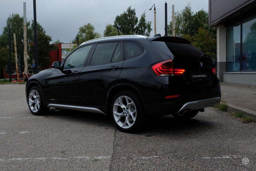Black BMW X1 2014 in Vilnius, with an engine capacity of 2.00 L and mileage of 206 thousand km for 7999 €, photo 4 on AUTOMOTO.COM.LV