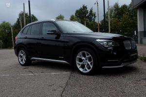 Black BMW X1 2014 in Vilnius, with an engine capacity of 2.00 L and mileage of 206 thousand km for 7999 €, photo 9 on AUTOMOTO.COM.LV