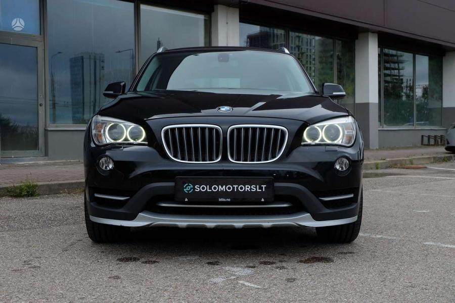 Black BMW X1 2014 in Vilnius, with an engine capacity of 2.00 L and mileage of 206 thousand km for 7999 €, photo 11 on AUTOMOTO.COM.LV