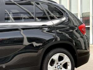 Black BMW X1 2014 in Vilnius, with an engine capacity of 2.00 L and mileage of 113 thousand km for 8290 €, photo 4 on AUTOMOTO.COM.LV