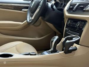 Black BMW X1 2014 in Vilnius, with an engine capacity of 2.00 L and mileage of 113 thousand km for 8290 €, photo 21 on AUTOMOTO.COM.LV