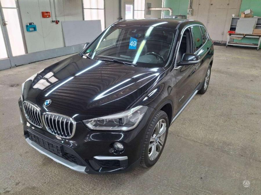 Black BMW X1 2015 in Vilnius, with an engine capacity of 2.00 L and mileage of 171 thousand km for 12990 €, photo 1 on AUTOMOTO.COM.LV