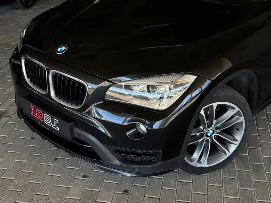 Black BMW X1 2015 in Riga, with an engine capacity of 2.00 L and mileage of 223 thousand km for 11800 €, photo 7 on AUTOMOTO.COM.LV