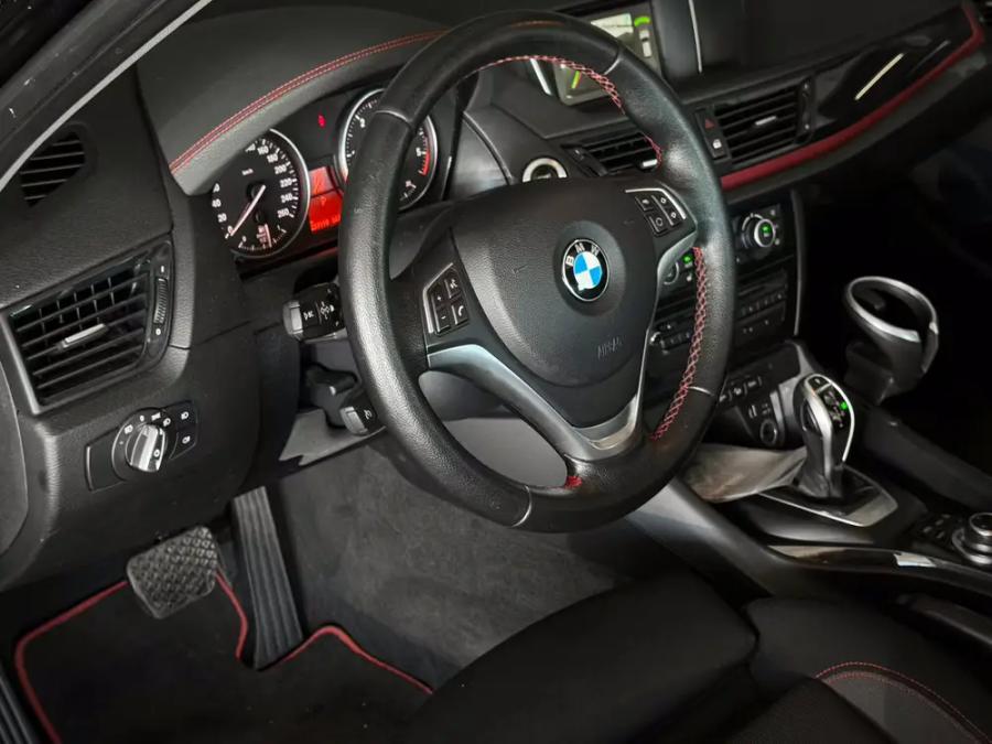Black BMW X1 2015 in Riga, with an engine capacity of 2.00 L and mileage of 223 thousand km for 11800 €, photo 8 on AUTOMOTO.COM.LV