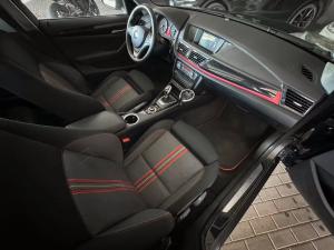 Black BMW X1 2015 in Riga, with an engine capacity of 2.00 L and mileage of 223 thousand km for 11800 €, photo 11 on AUTOMOTO.COM.LV