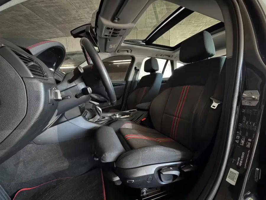 Black BMW X1 2015 in Riga, with an engine capacity of 2.00 L and mileage of 223 thousand km for 11800 €, photo 12 on AUTOMOTO.COM.LV