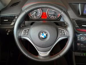 Black BMW X1 2015 in Riga, with an engine capacity of 2.00 L and mileage of 223 thousand km for 11800 €, photo 14 on AUTOMOTO.COM.LV
