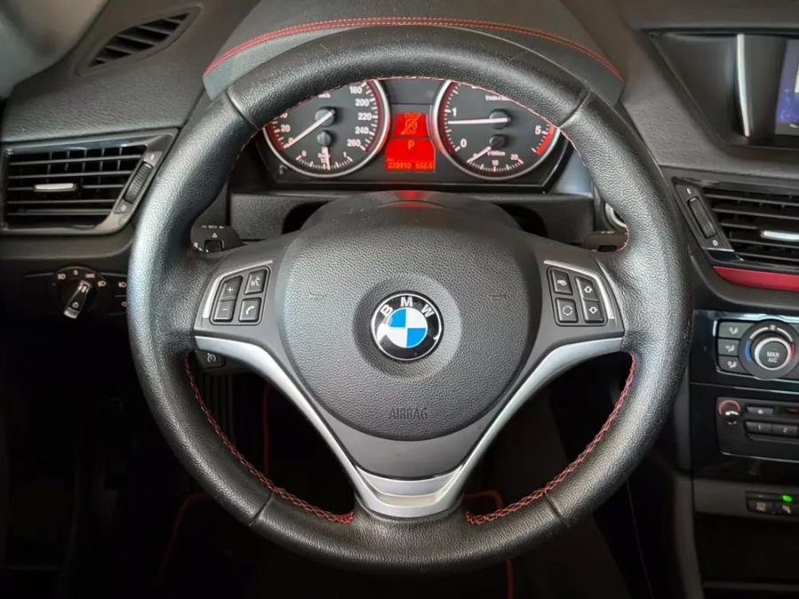 Black BMW X1 2015 in Riga, with an engine capacity of 2.00 L and mileage of 223 thousand km for 11800 €, photo 14 on AUTOMOTO.COM.LV