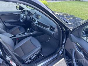 Black BMW X1 2015 in Cesis, with an engine capacity of 2.00 L and mileage of 290 thousand km for 8750 €, photo 14 on AUTOMOTO.COM.LV