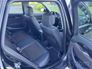 Black BMW X1 2015 in Cesis, with an engine capacity of 2.00 L and mileage of 290 thousand km for 8750 €, photo 16 on AUTOMOTO.COM.LV