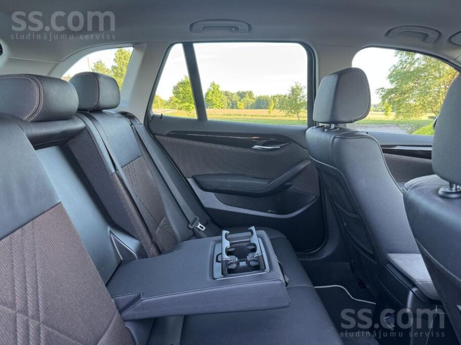 Black BMW X1 2015 in Cesis, with an engine capacity of 2.00 L and mileage of 290 thousand km for 8750 €, photo 17 on AUTOMOTO.COM.LV