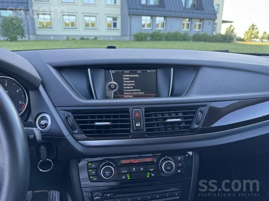 Black BMW X1 2015 in Cesis, with an engine capacity of 2.00 L and mileage of 290 thousand km for 8750 €, photo 21 on AUTOMOTO.COM.LV