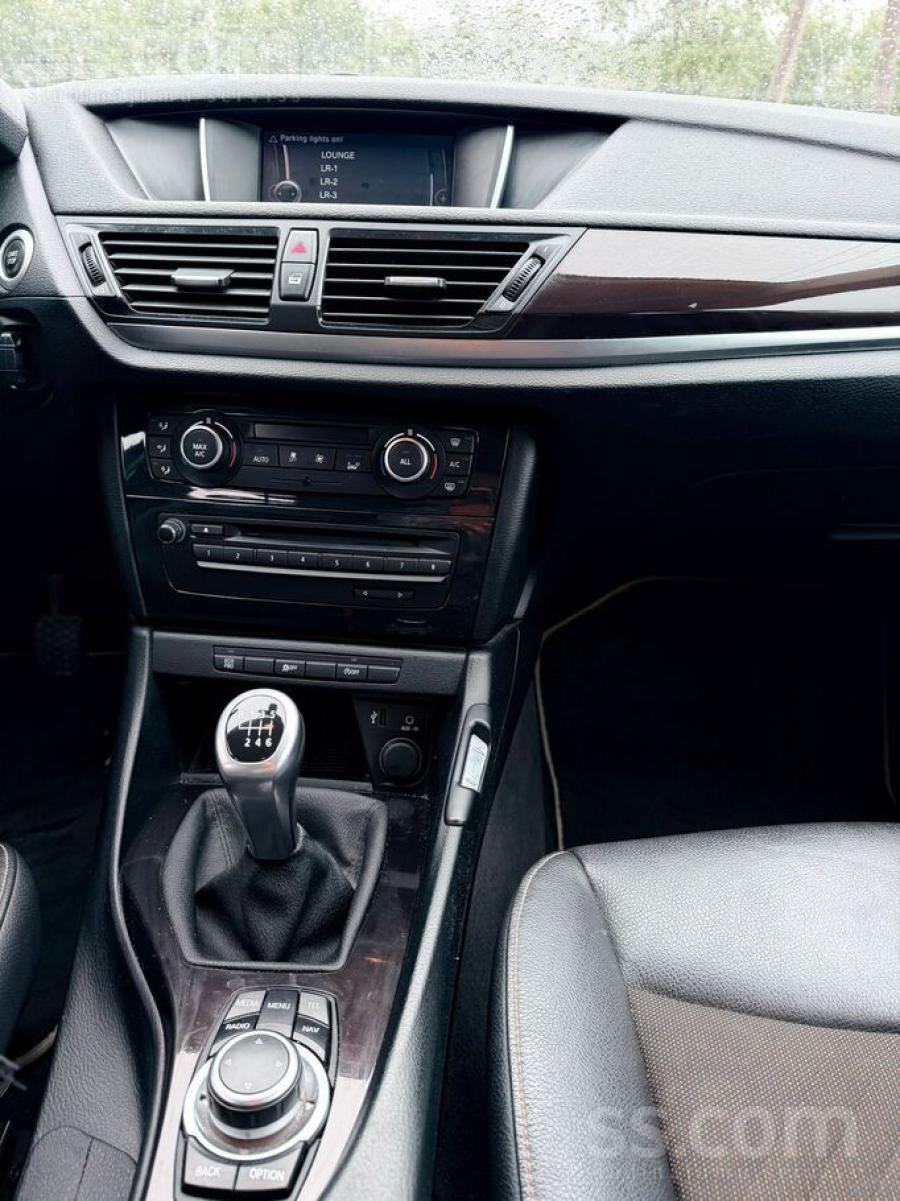 Black BMW X1 2015 in Cesis, with an engine capacity of 2.00 L and mileage of 340 thousand km for 8900 €, photo 7 on AUTOMOTO.COM.LV