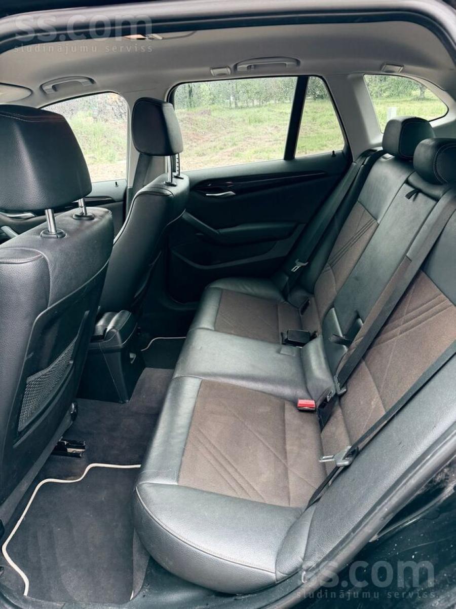 Black BMW X1 2015 in Cesis, with an engine capacity of 2.00 L and mileage of 340 thousand km for 8900 €, photo 11 on AUTOMOTO.COM.LV