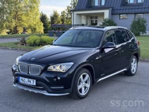 Black BMW X1 2015 in Cesis, with an engine capacity of 2.00 L and mileage of 290 thousand km for 8750 €, photo 6 on AUTOMOTO.COM.LV
