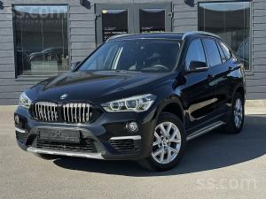 Black BMW X1 2016 in Jelgava, with an engine capacity of 2.00 L and mileage of 235 thousand km for 15450 €, photo 1 on AUTOMOTO.COM.LV