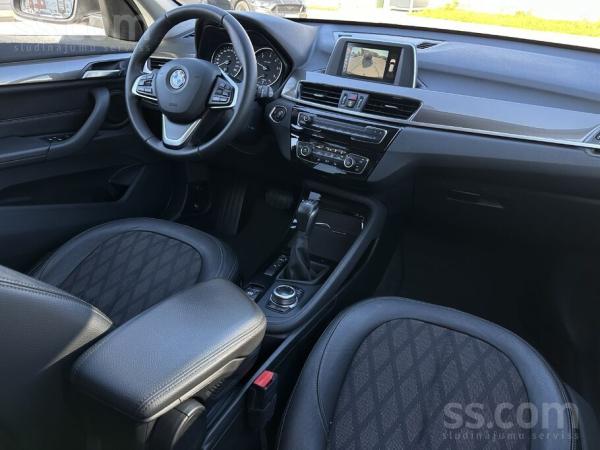 Black BMW X1 2016 in Jelgava, with an engine capacity of 2.00 L and mileage of 235 thousand km for 15450 €, photo 4 on AUTOMOTO.COM.LV
