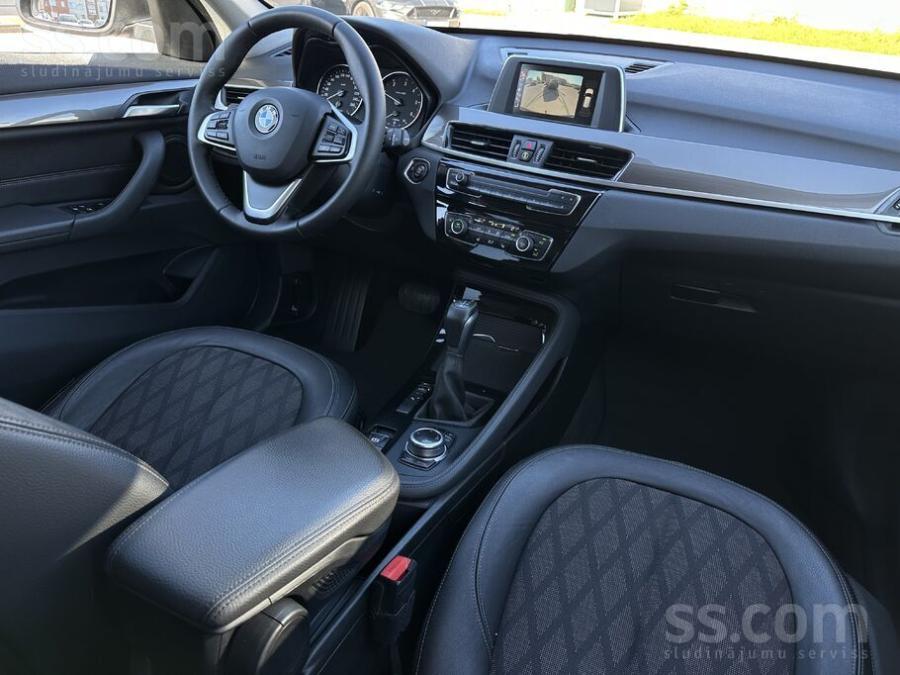Black BMW X1 2016 in Jelgava, with an engine capacity of 2.00 L and mileage of 235 thousand km for 15450 €, photo 4 on AUTOMOTO.COM.LV