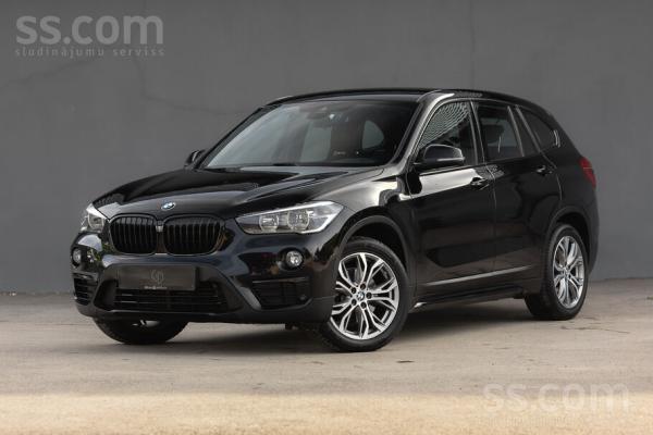 Black BMW X1 2016 in Jelgava, with an engine capacity of 2.00 L and mileage of 235 thousand km for 8990 €, photo 1 on AUTOMOTO.COM.LV