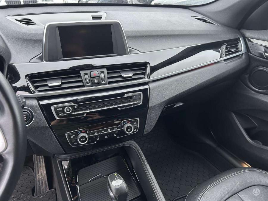 Black BMW X1 2016 in Utena, with an engine capacity of 2.00 L and mileage of 250 thousand km for 9200 €, photo 14 on AUTOMOTO.COM.LV