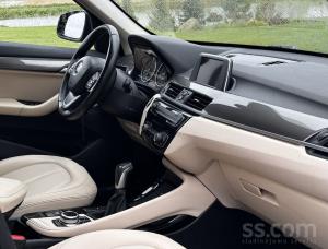Black BMW X1 2016 in Riga, with an engine capacity of 2.00 L and mileage of 267 thousand km for 9900 €, photo 7 on AUTOMOTO.COM.LV