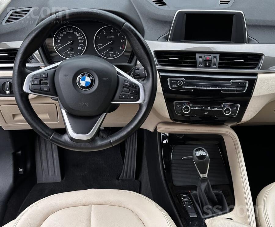 Black BMW X1 2016 in Riga, with an engine capacity of 2.00 L and mileage of 267 thousand km for 9900 €, photo 8 on AUTOMOTO.COM.LV