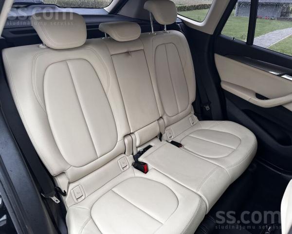 Black BMW X1 2016 in Riga, with an engine capacity of 2.00 L and mileage of 267 thousand km for 9900 €, photo 9 on AUTOMOTO.COM.LV