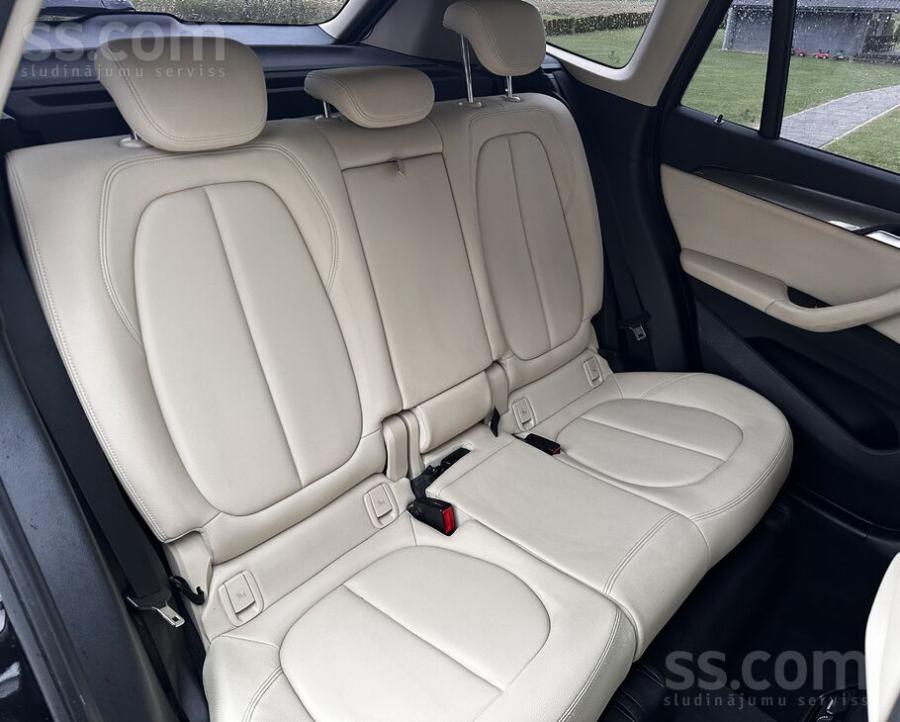 Black BMW X1 2016 in Riga, with an engine capacity of 2.00 L and mileage of 267 thousand km for 9900 €, photo 10 on AUTOMOTO.COM.LV