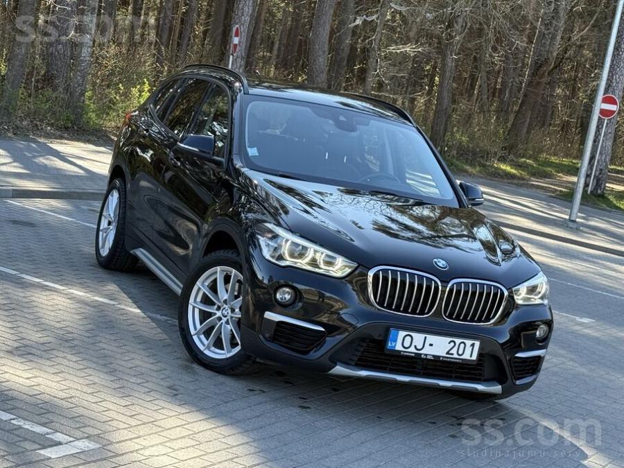 Black BMW X1 2016 in Jurmala, with an engine capacity of 2.00 L and mileage of 0 thousand km for 13950 €, photo 1 on AUTOMOTO.COM.LV