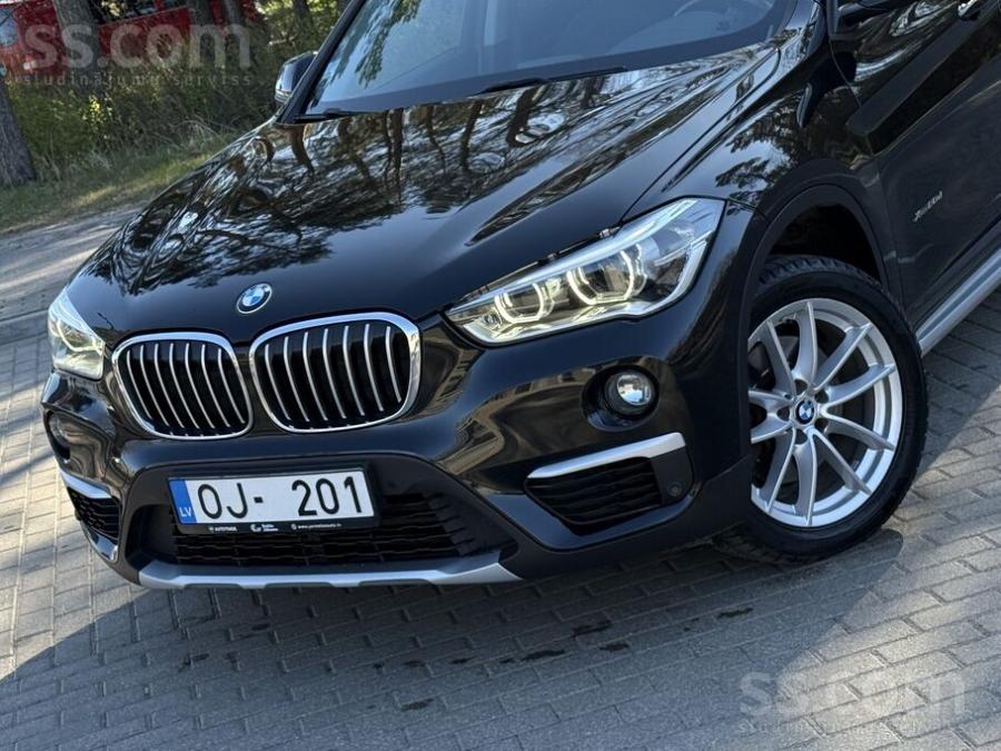Black BMW X1 2016 in Jurmala, with an engine capacity of 2.00 L and mileage of 0 thousand km for 13950 €, photo 5 on AUTOMOTO.COM.LV