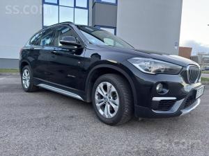 Black BMW X1 2016 in Cesis, with an engine capacity of 2.00 L and mileage of 185 thousand km for 12800 €, photo 4 on AUTOMOTO.COM.LV