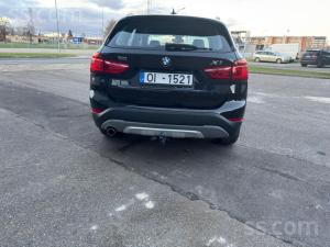 Black BMW X1 2016 in Cesis, with an engine capacity of 2.00 L and mileage of 185 thousand km for 12800 €, photo 7 on AUTOMOTO.COM.LV