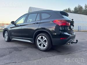 Black BMW X1 2016 in Cesis, with an engine capacity of 2.00 L and mileage of 185 thousand km for 12800 €, photo 8 on AUTOMOTO.COM.LV
