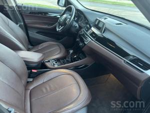 Black BMW X1 2016 in Cesis, with an engine capacity of 2.00 L and mileage of 185 thousand km for 12800 €, photo 10 on AUTOMOTO.COM.LV