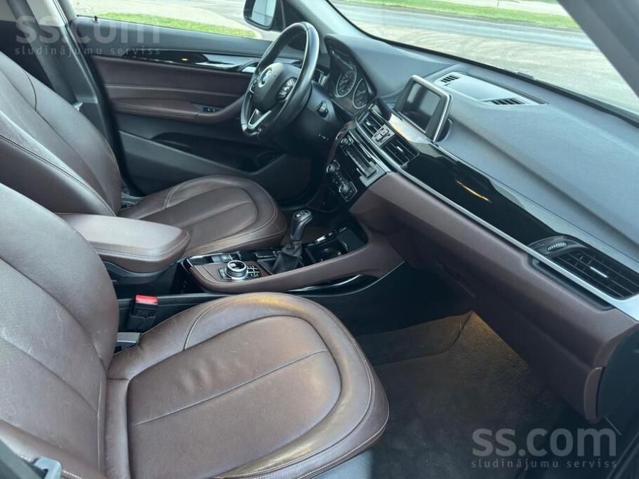 Black BMW X1 2016 in Cesis, with an engine capacity of 2.00 L and mileage of 185 thousand km for 12800 €, photo 10 on AUTOMOTO.COM.LV