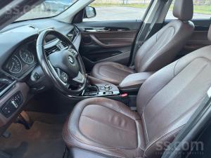Black BMW X1 2016 in Cesis, with an engine capacity of 2.00 L and mileage of 185 thousand km for 12800 €, photo 11 on AUTOMOTO.COM.LV