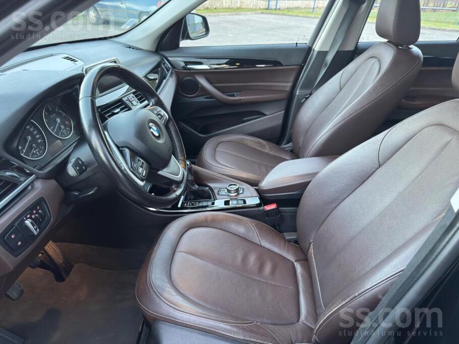 Black BMW X1 2016 in Cesis, with an engine capacity of 2.00 L and mileage of 185 thousand km for 12800 €, photo 11 on AUTOMOTO.COM.LV
