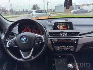 Black BMW X1 2016 in Cesis, with an engine capacity of 2.00 L and mileage of 185 thousand km for 12800 €, photo 13 on AUTOMOTO.COM.LV
