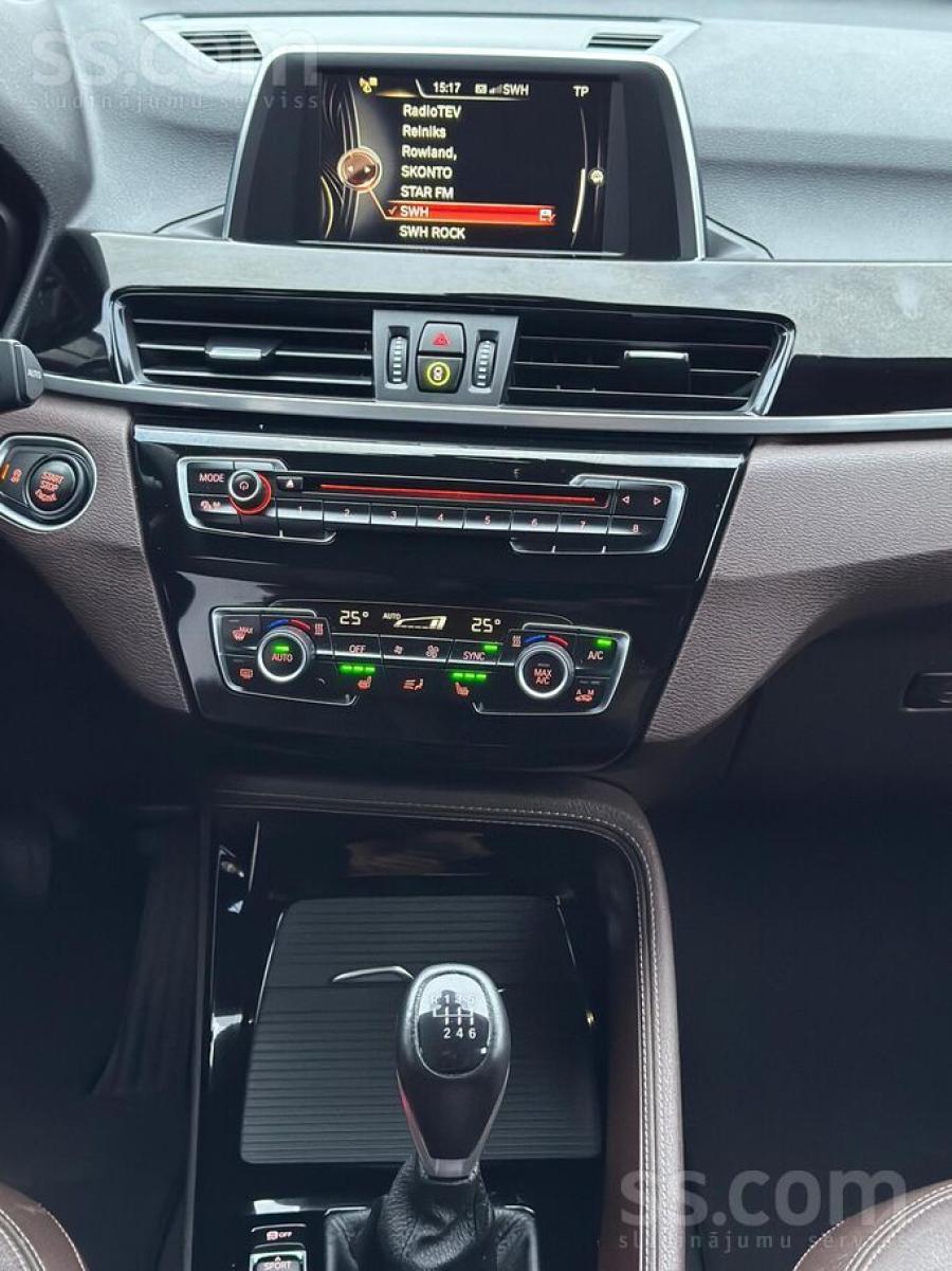 Black BMW X1 2016 in Cesis, with an engine capacity of 2.00 L and mileage of 185 thousand km for 12800 €, photo 14 on AUTOMOTO.COM.LV