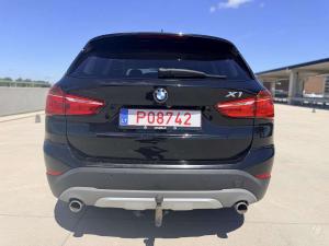Black BMW X1 2016 in Vilnius, with an engine capacity of 2.00 L and mileage of 214 thousand km for 10600 €, photo 5 on AUTOMOTO.COM.LV