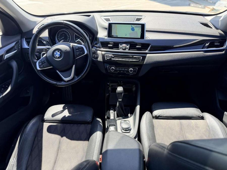 Black BMW X1 2016 in Vilnius, with an engine capacity of 2.00 L and mileage of 214 thousand km for 10600 €, photo 22 on AUTOMOTO.COM.LV