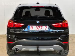 Black BMW X1 2016 in Jurmala, with an engine capacity of 2.00 L and mileage of 269 thousand km for 11990 €, photo 12 on AUTOMOTO.COM.LV